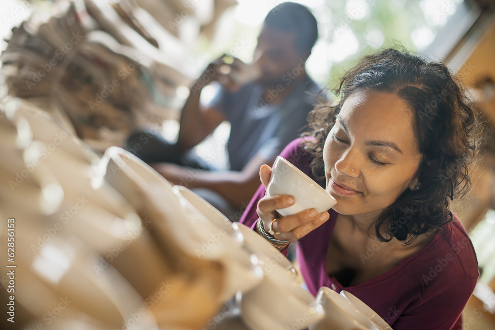 The sampling procedure in a coffee processing shed, where staff make ...