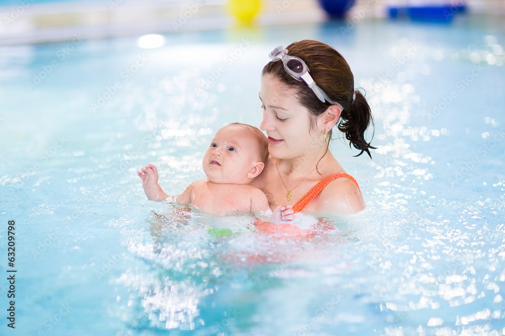 Little baby boy first time in a swimming pool Stock Photo | Adobe Stock