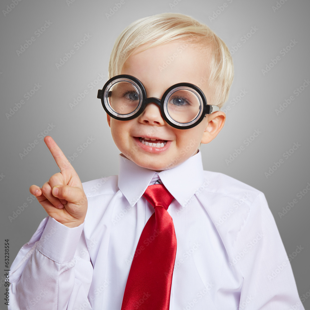 Kluges Kind mit Brille meldet sich Stock Photo | Adobe Stock