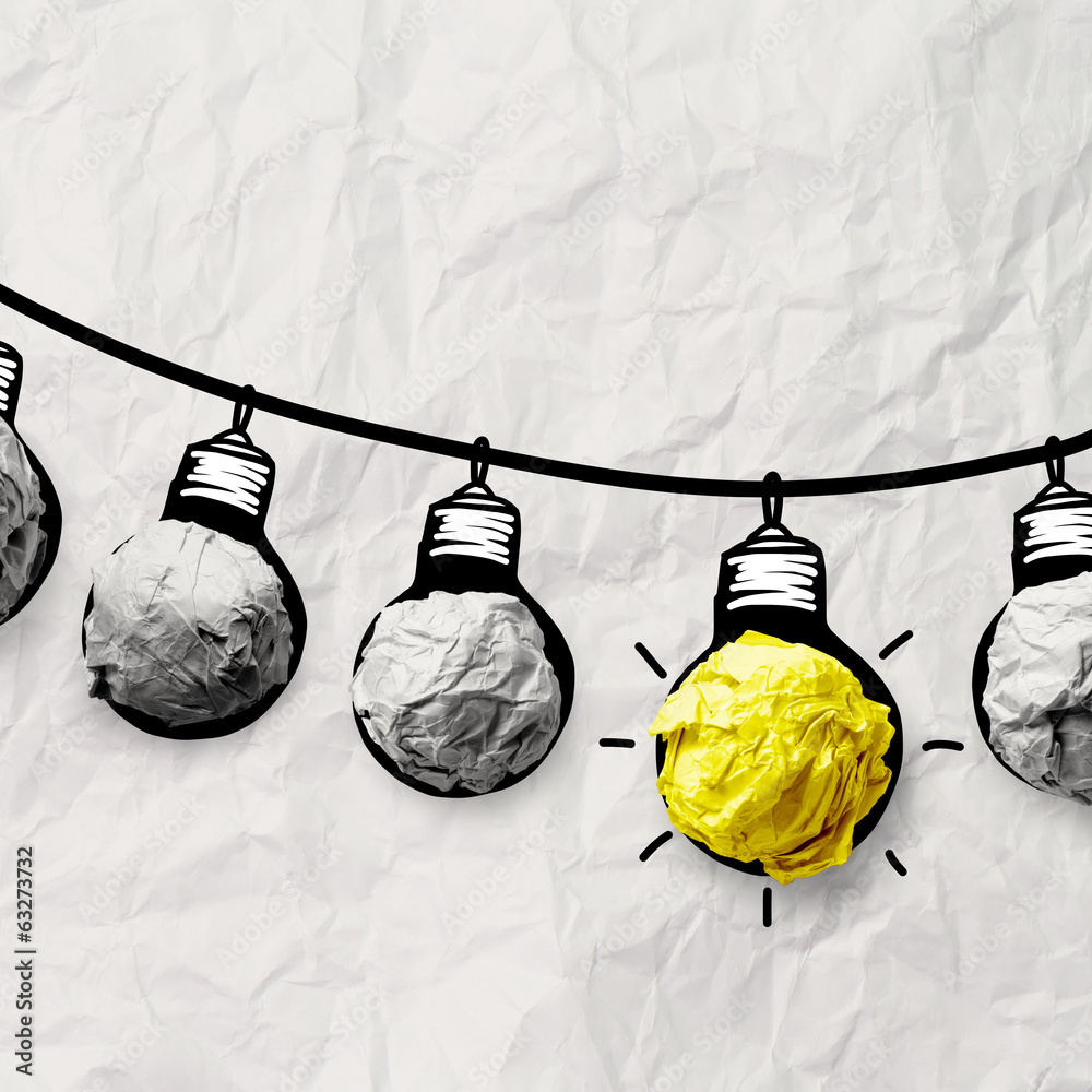 hand drawn light bulb on wire doodle with crumpled paper as lead Stock ...