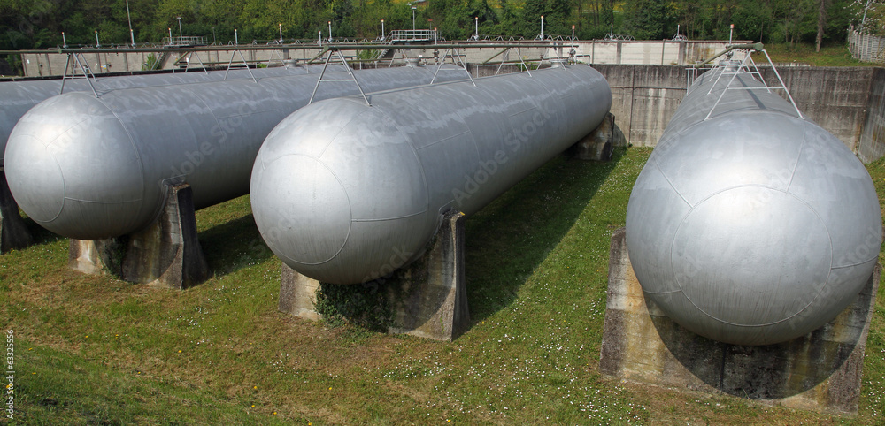 gray giant tanks and large huge cistern the storage of gas and l Stock ...