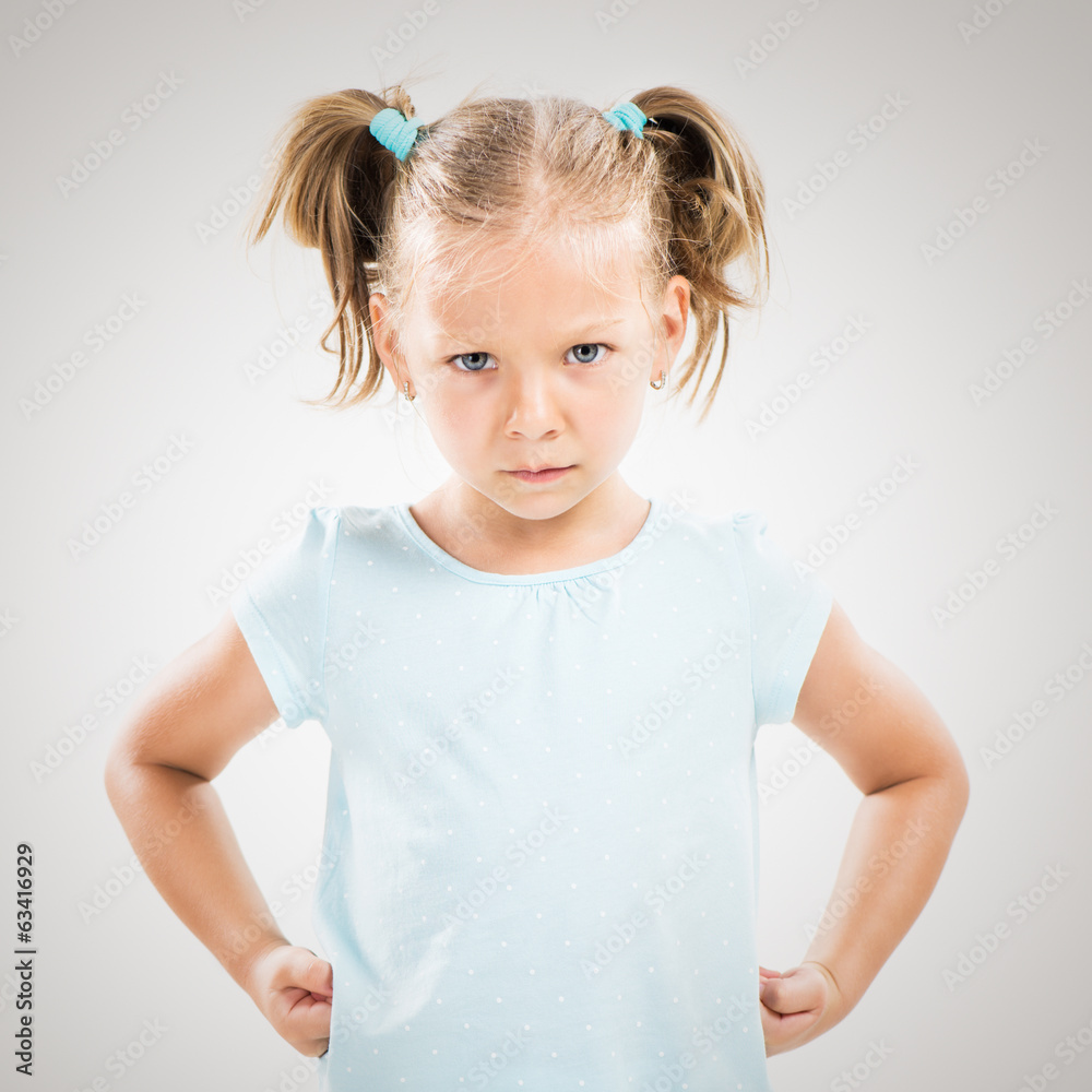 Angry little girl Stock Photo | Adobe Stock