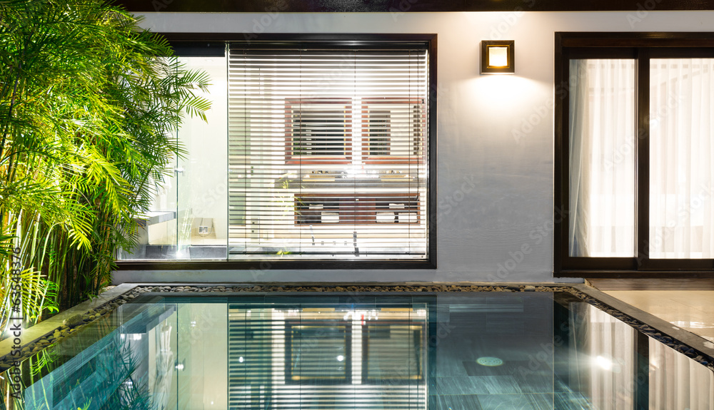 Luxury hotel room with swimming pool and palms. Stock Photo | Adobe Stock