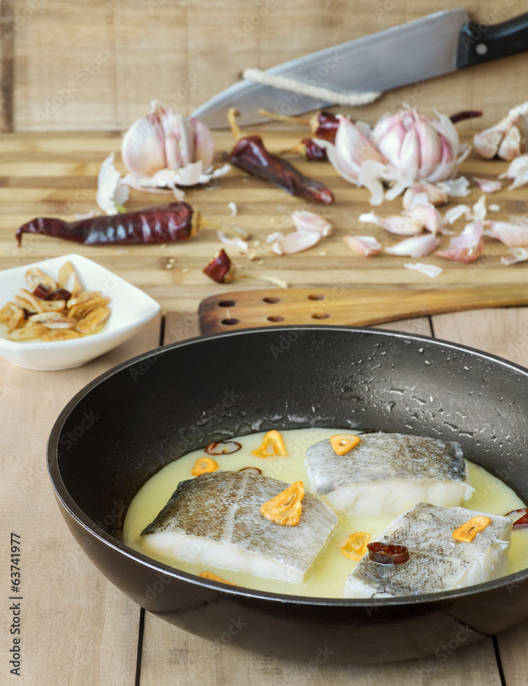 Cod with Pil Pil Sauce, Basque cookery. foto de Stock | Adobe Stock