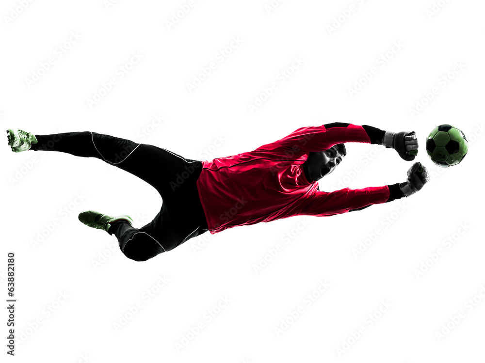 caucasian soccer player goalkeeper man punching ball silhouette Stock ...