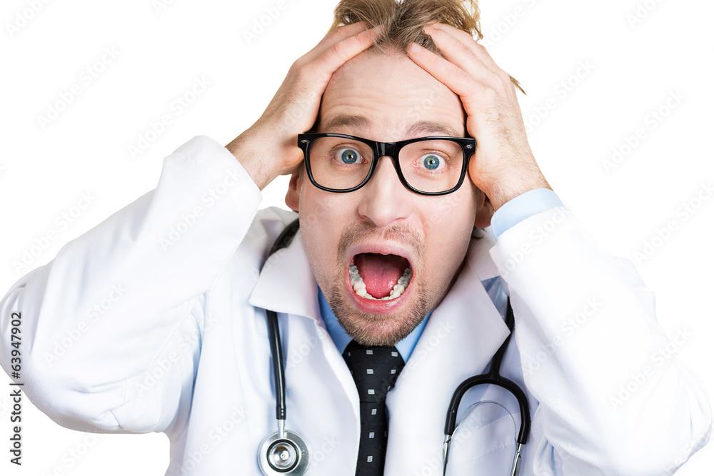 Oh no. Stressed, shocked, overwhelmed male doctor Stock Photo | Adobe Stock