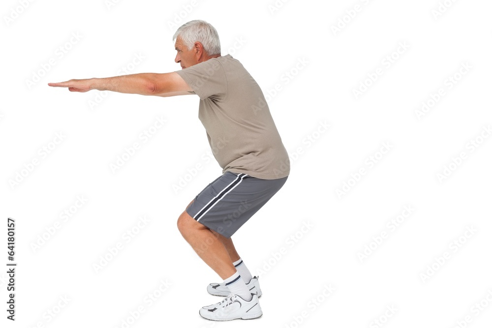 Full length side view of a senior man stretching hands Stock Photo ...