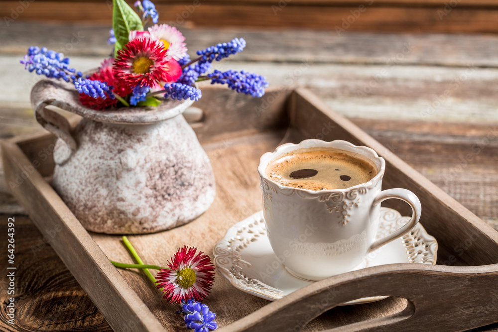Foto de Coffee and spring flowers for breakfast do Stock | Adobe Stock