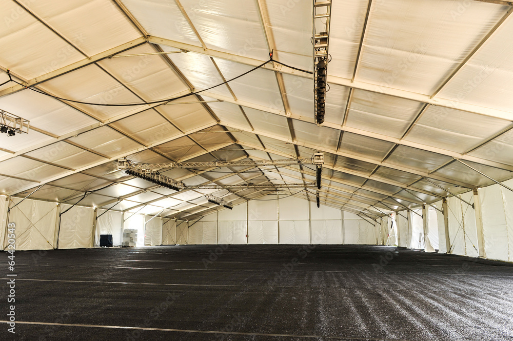 Inside of a huge white tent with rafters Stock Photo | Adobe Stock