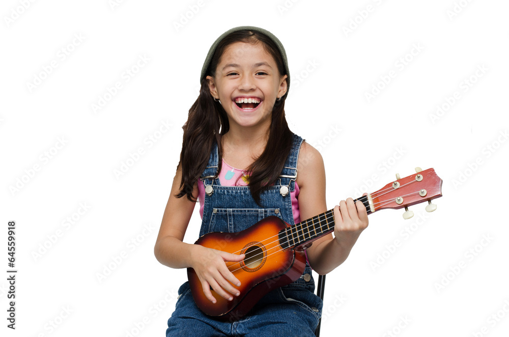 Little girl playing ukulele on white background Stock Photo | Adobe Stock