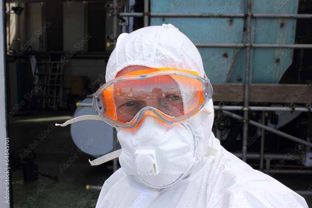 Industrial Cleaner wearing his full ppe for a boiler clean Stock Photo ...