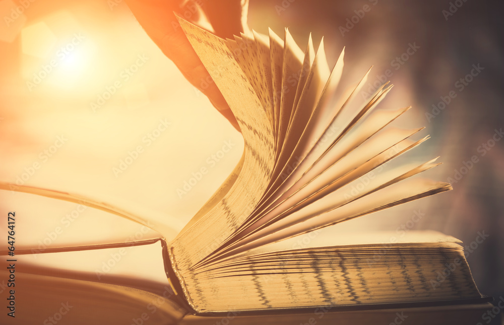 scrolling open book pages Stock Photo | Adobe Stock