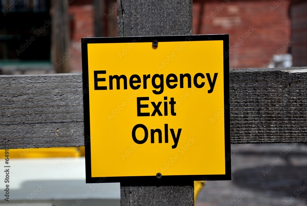 Emergency exit only signage Stock Photo | Adobe Stock
