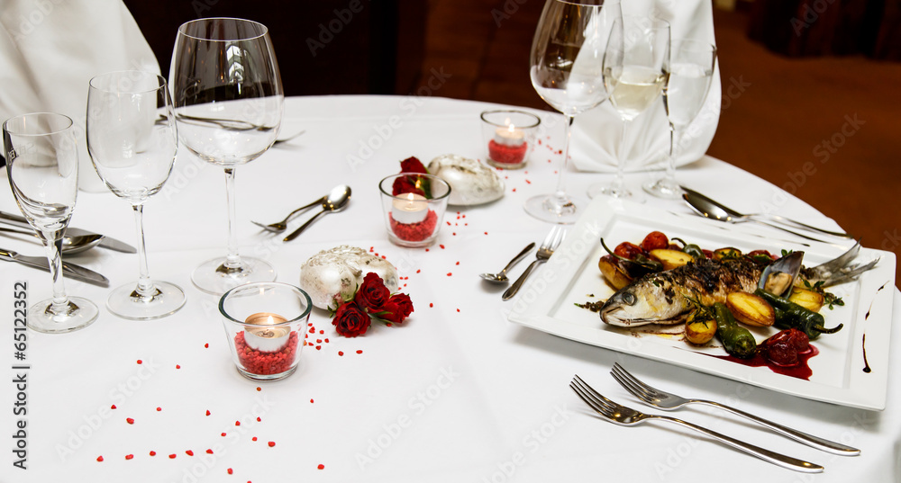 Laid for lunch table with a fish menu Stock-Foto | Adobe Stock
