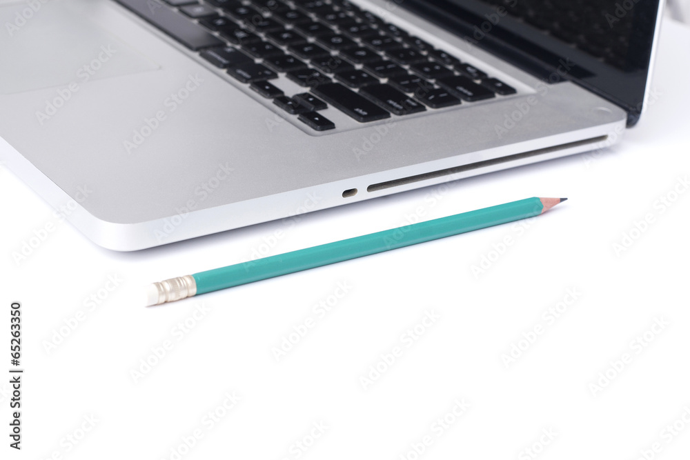 pencil and eraser on the laptop Stock Photo | Adobe Stock