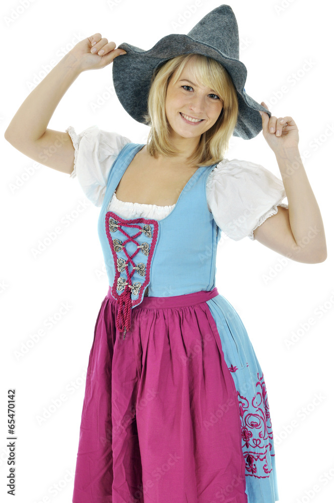 Frau im Dirndl trägt Seppel-Hut Stock-Foto | Adobe Stock