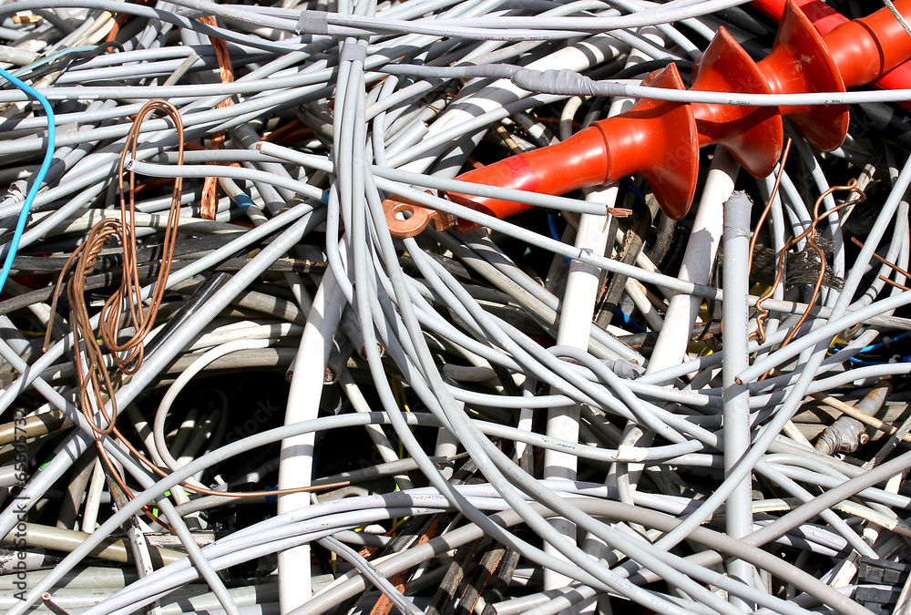 pieces of cord and high-voltage electric wires in an industrial Stock ...
