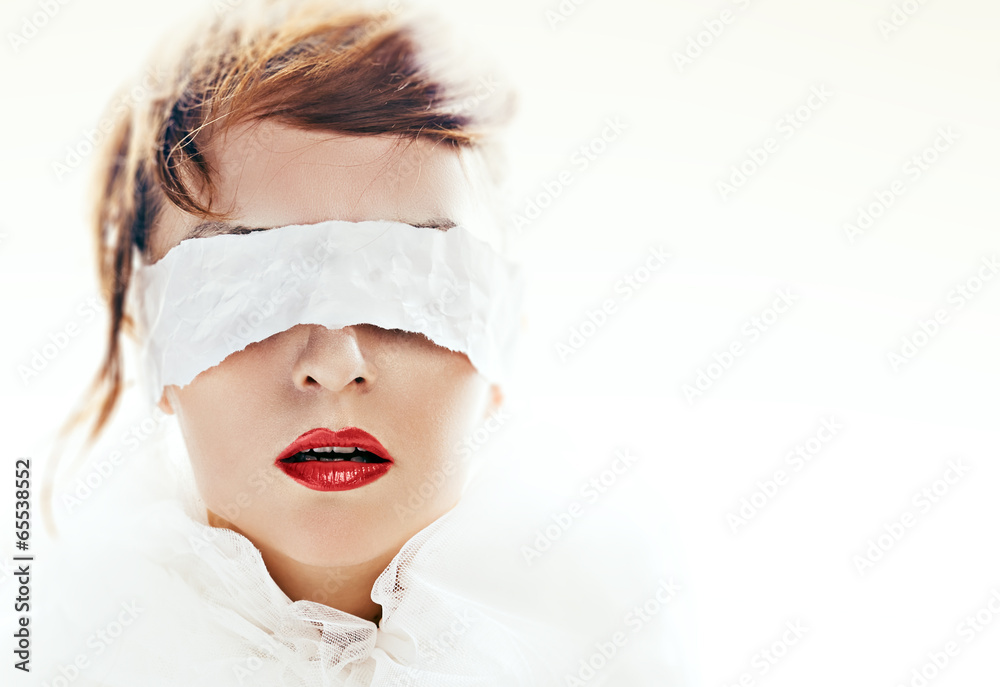 Portrait of attractive woman blindfolded with white paper ribbon Stock ...