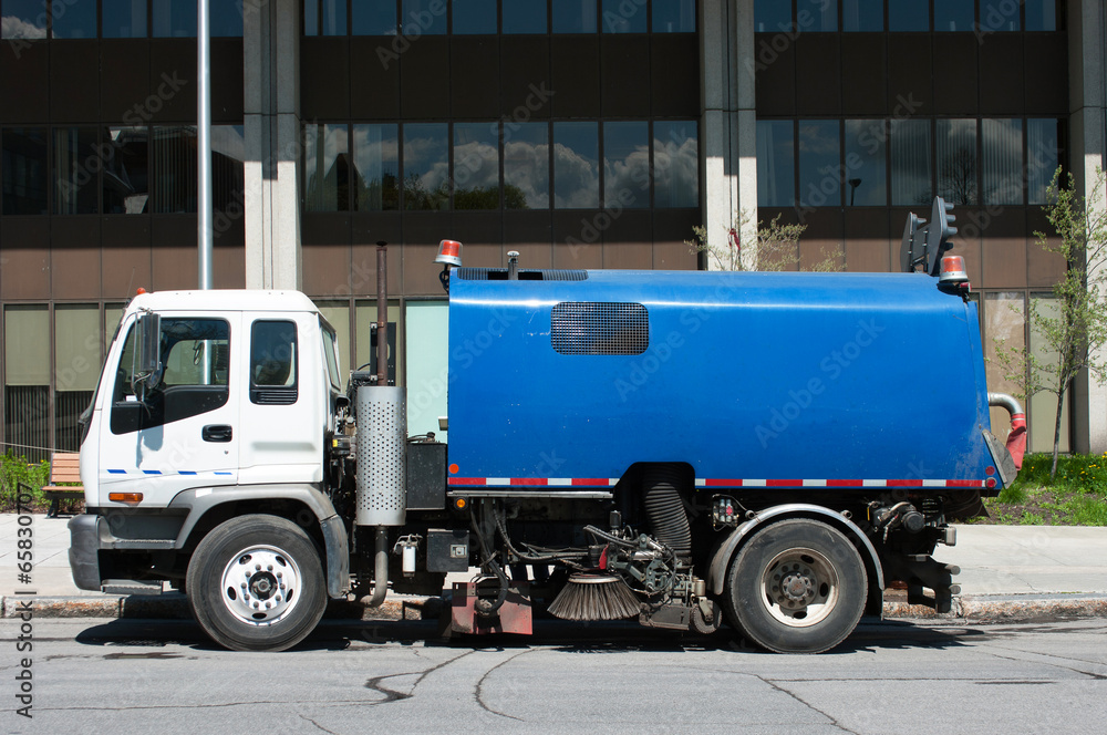 Street cleaning machine parked on the street Stock Photo | Adobe Stock