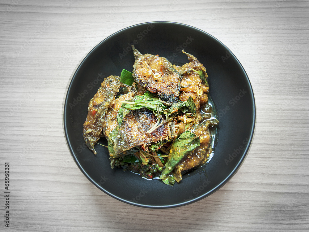 Santed eat fish with chilli paste a spicy Thai food in black bow Stock ...