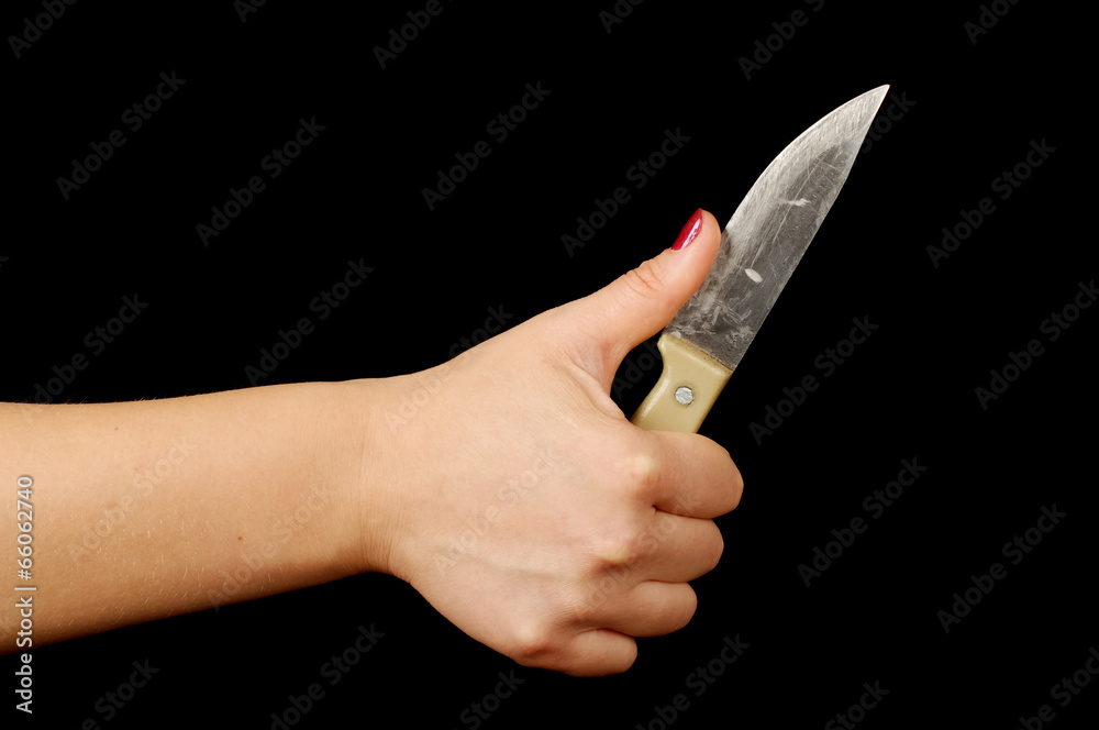 Risk concept female hand unsafe holding knife Stock Photo | Adobe Stock