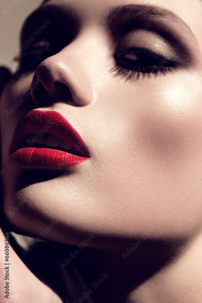 Beautiful young model with red lips. Gorgeous Face. Stock Photo | Adobe ...