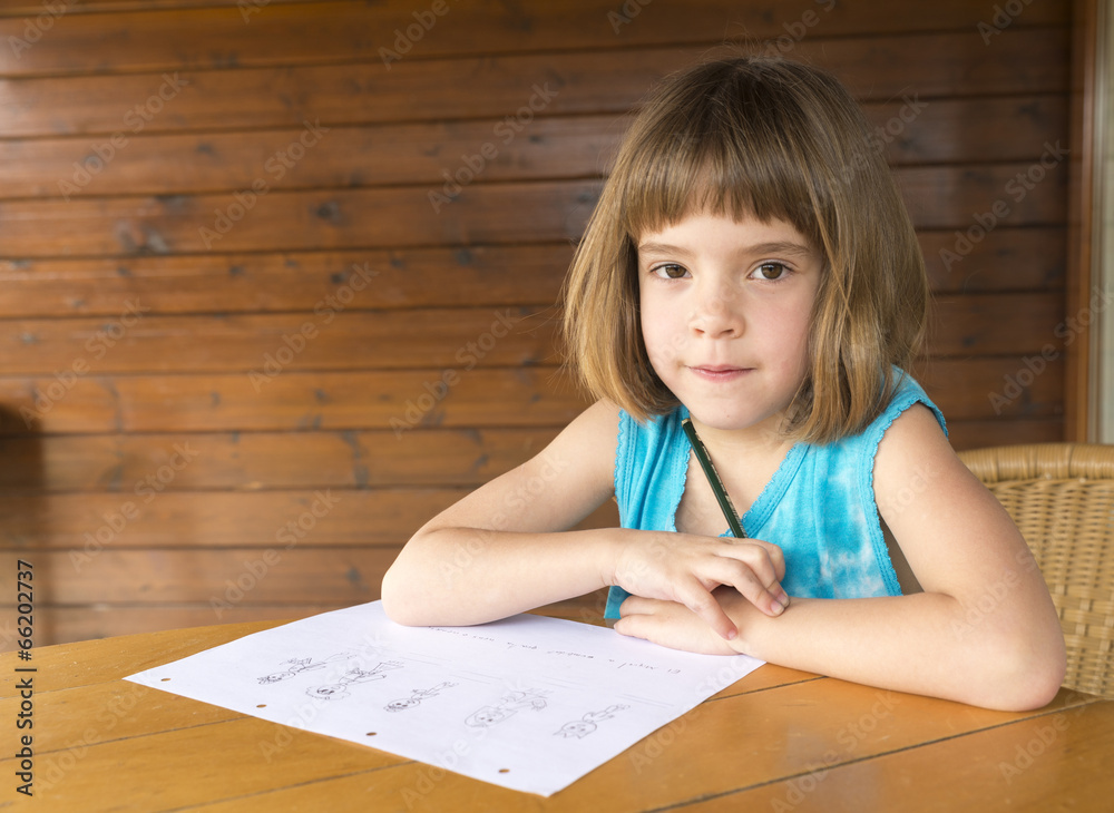 Little girl drawing Stock Photo | Adobe Stock