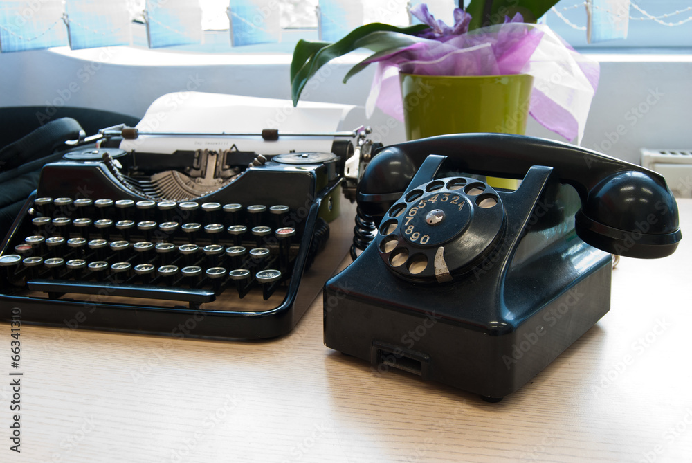 Vintage typewriter and phone Stock Photo | Adobe Stock