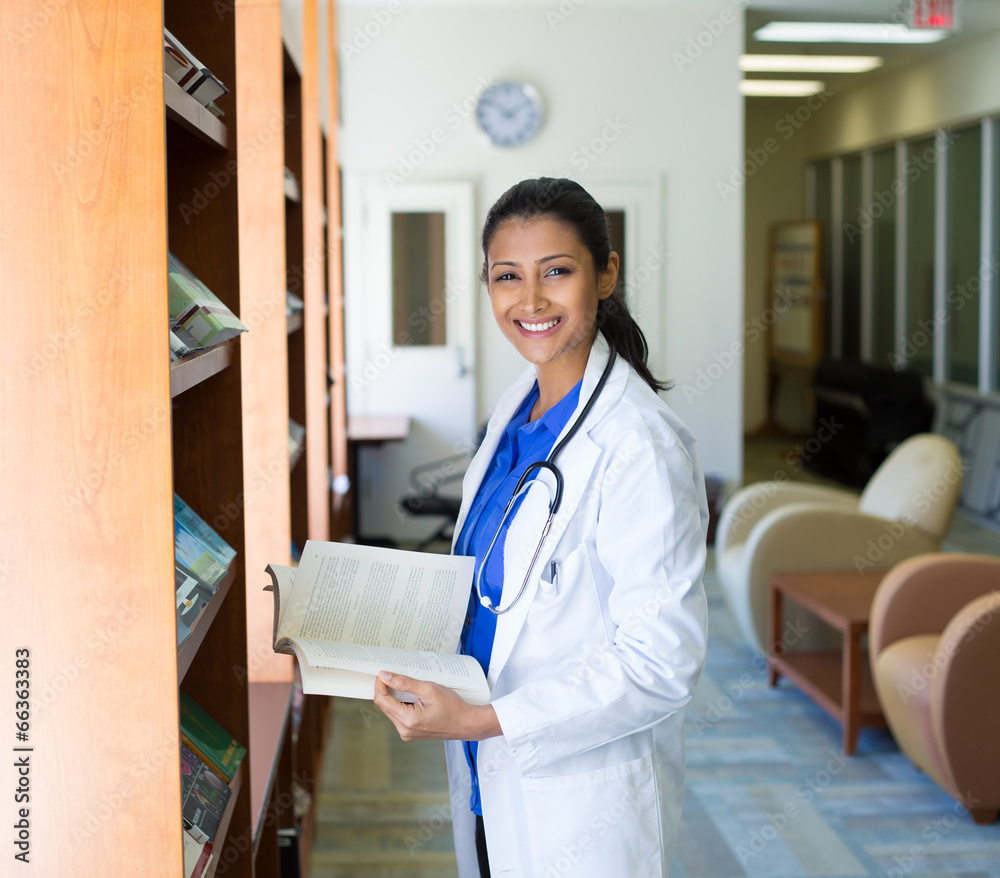 Healthcare professional reading Stock Photo | Adobe Stock