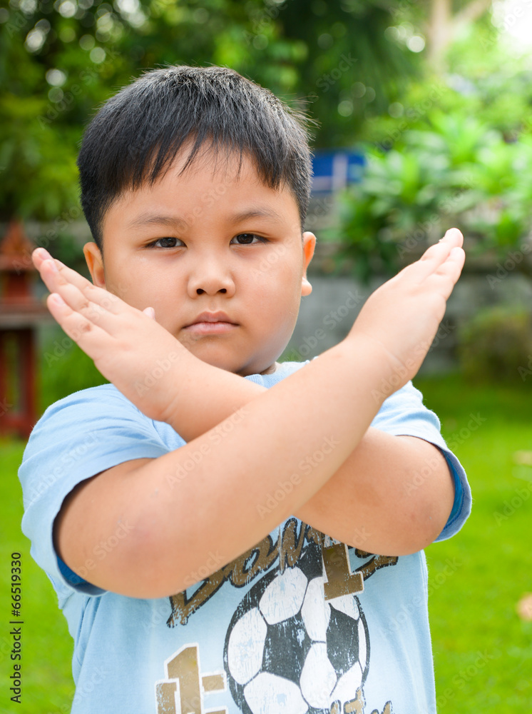 cute boy show stop hand symbol. Stock Photo | Adobe Stock