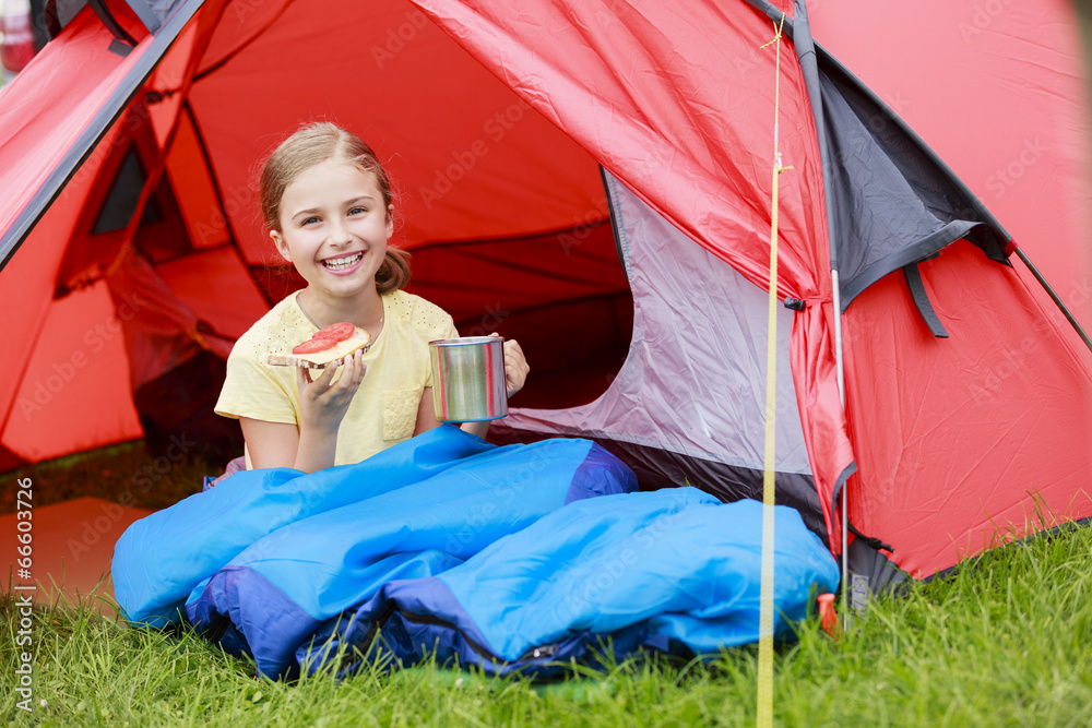 Camp in the tent - young girl on the camping Stock Photo | Adobe Stock
