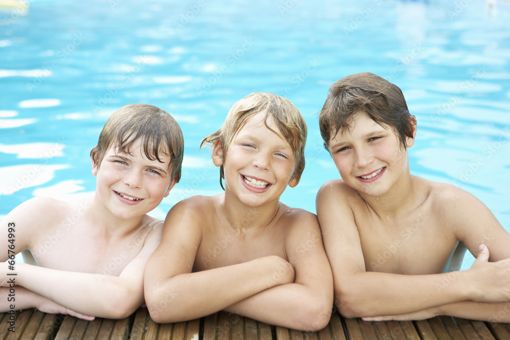 Boys in outdoor swimming pool Stock Photo | Adobe Stock