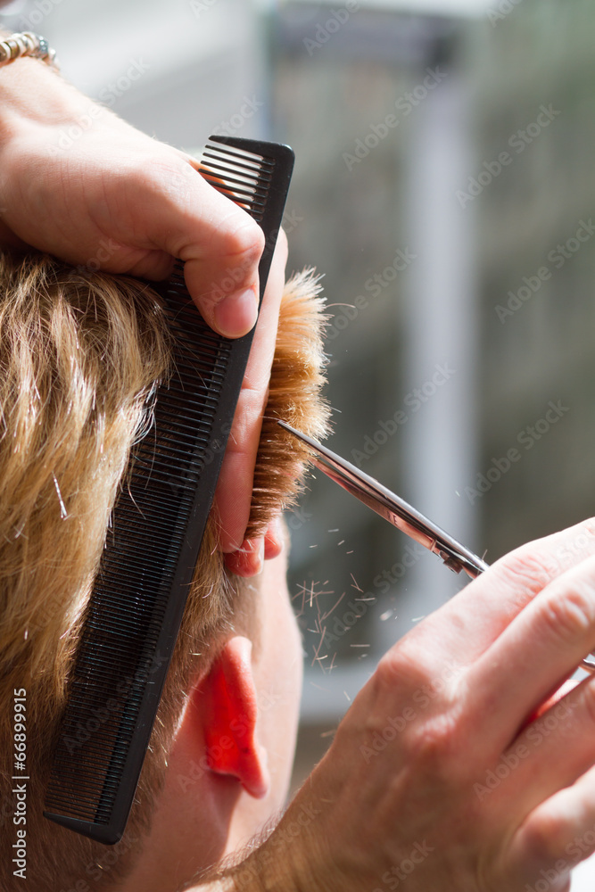 haircut with scissors Stock Photo | Adobe Stock