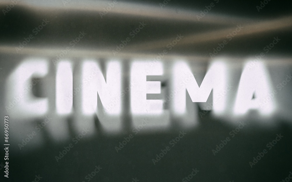 Cinema word on vintage blurred background Stock Photo | Adobe Stock