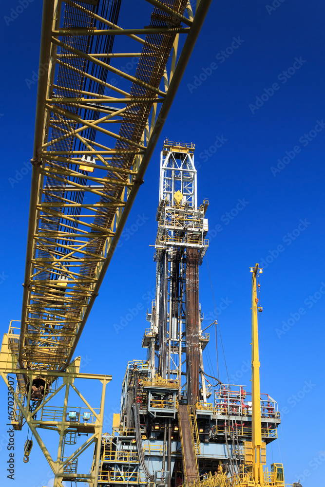 Derrick of Tender Drilling Oil Rig (Barge Oil Rig) on The Produc Stock ...