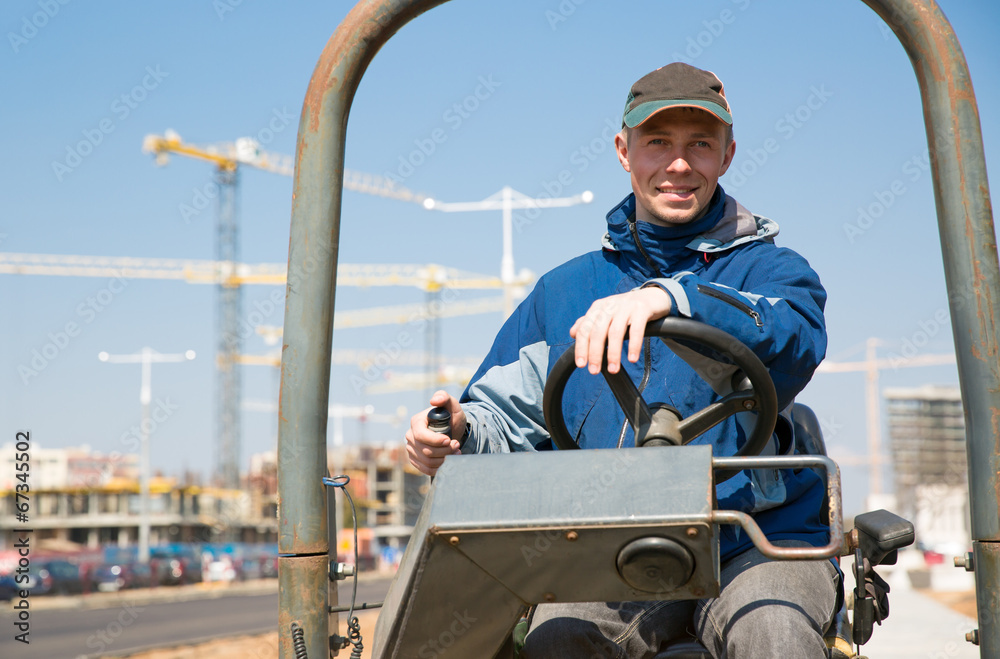 Positive driver worker during road construction works Stock 写真 | Adobe ...