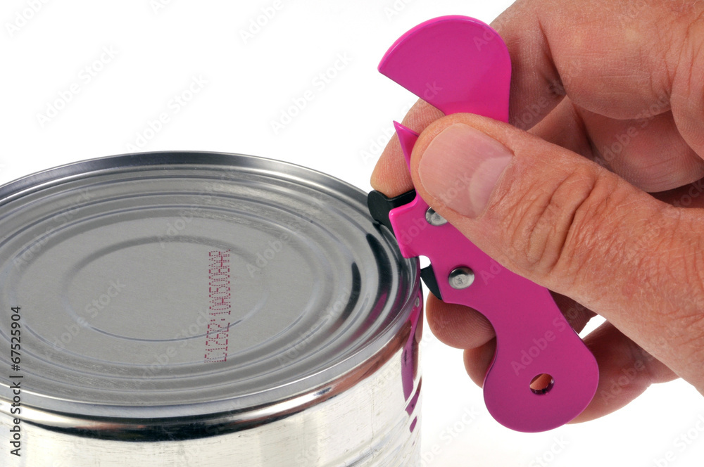 L'ouverture d'une boîte de conserve Stock Photo | Adobe Stock