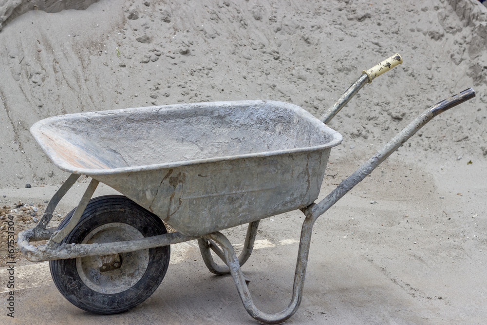 Classical concrete trolley, cement wheelbarrow Stock Photo | Adobe Stock