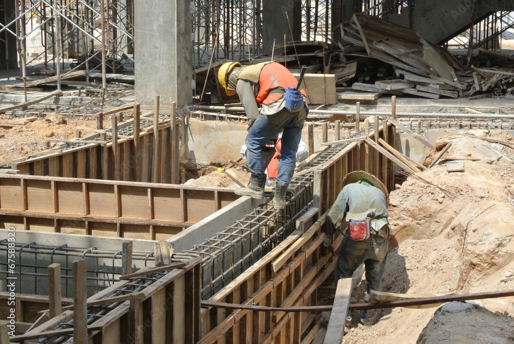 Two Construction Workers Installing Ground Beam Formwork Stock Photo ...