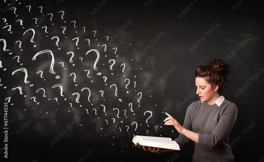 Pretty woman reading a book with question marks coming out from Stock ...