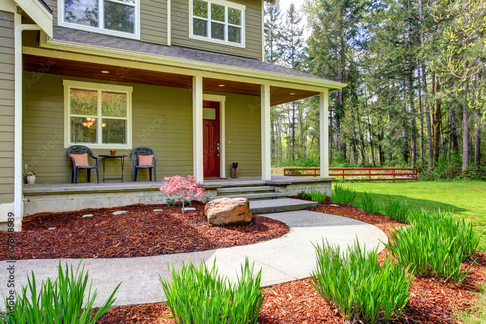 Countryside house exterior. View of entrance porch and curb appe Stock ...