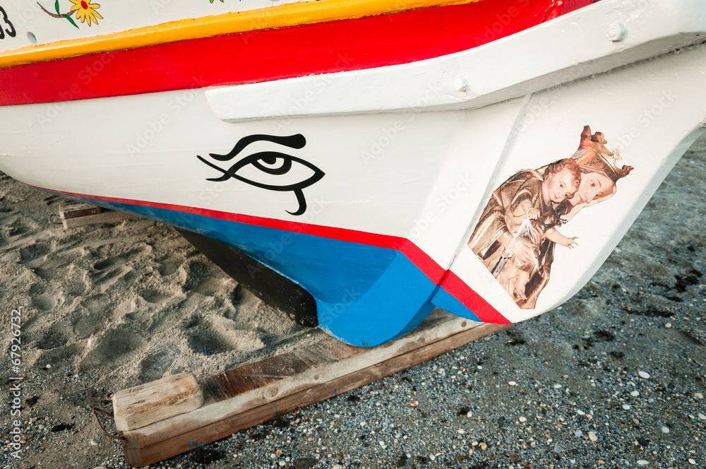 Virgin Mary and Jesus painted on a boat with phoenician symbol Stock ...
