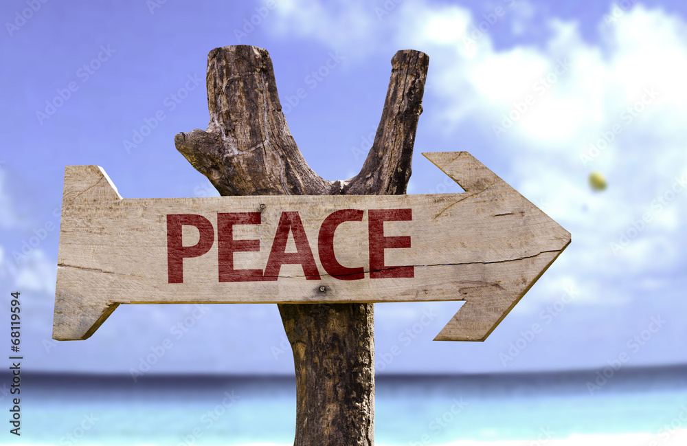 Peace wooden sign with a beach on background Stock Photo | Adobe Stock