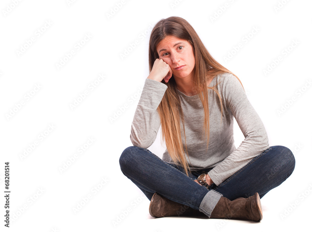 Worried girl sitting Stock Photo | Adobe Stock