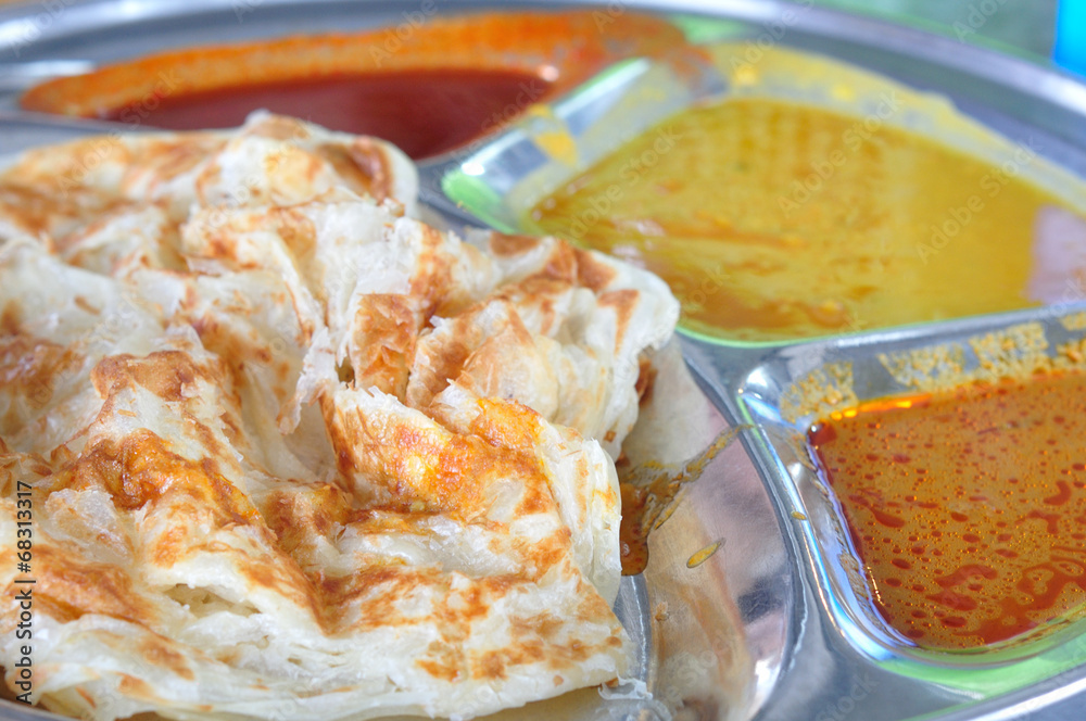 Curry and Roti canai flat bread, Indian food Stock Photo | Adobe Stock