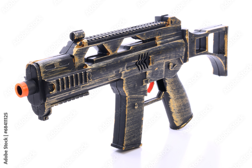 Toy gun on white Stock Photo | Adobe Stock