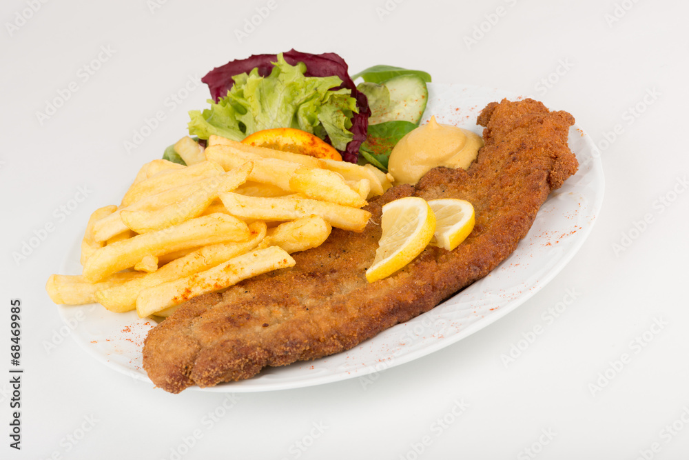 Schnitzel mit Pommes Stock Photo | Adobe Stock