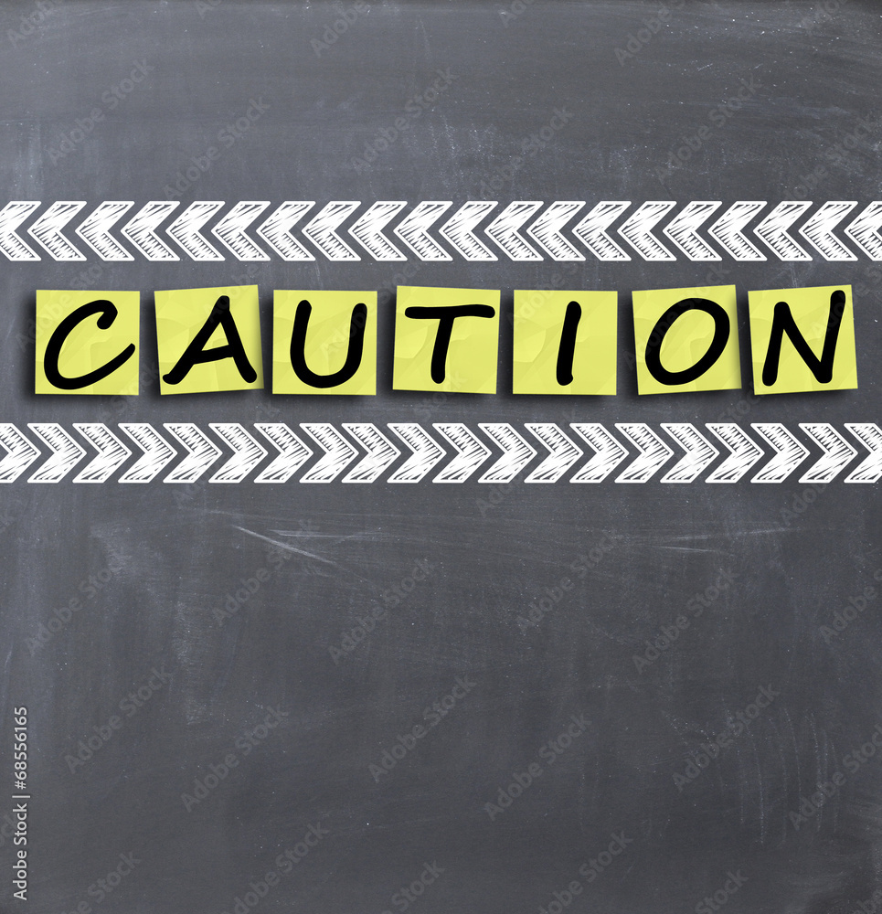 Caution text on blackboard ilustración de Stock | Adobe Stock