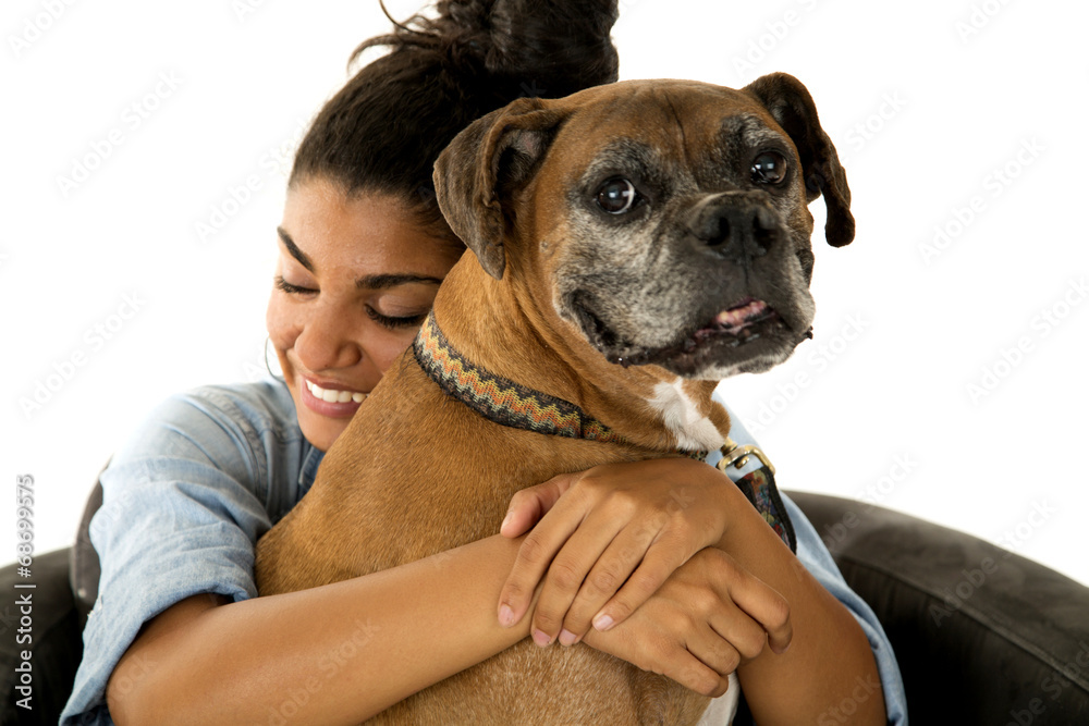 cute teenage girl hugging her dog a boxer Stock Photo | Adobe Stock