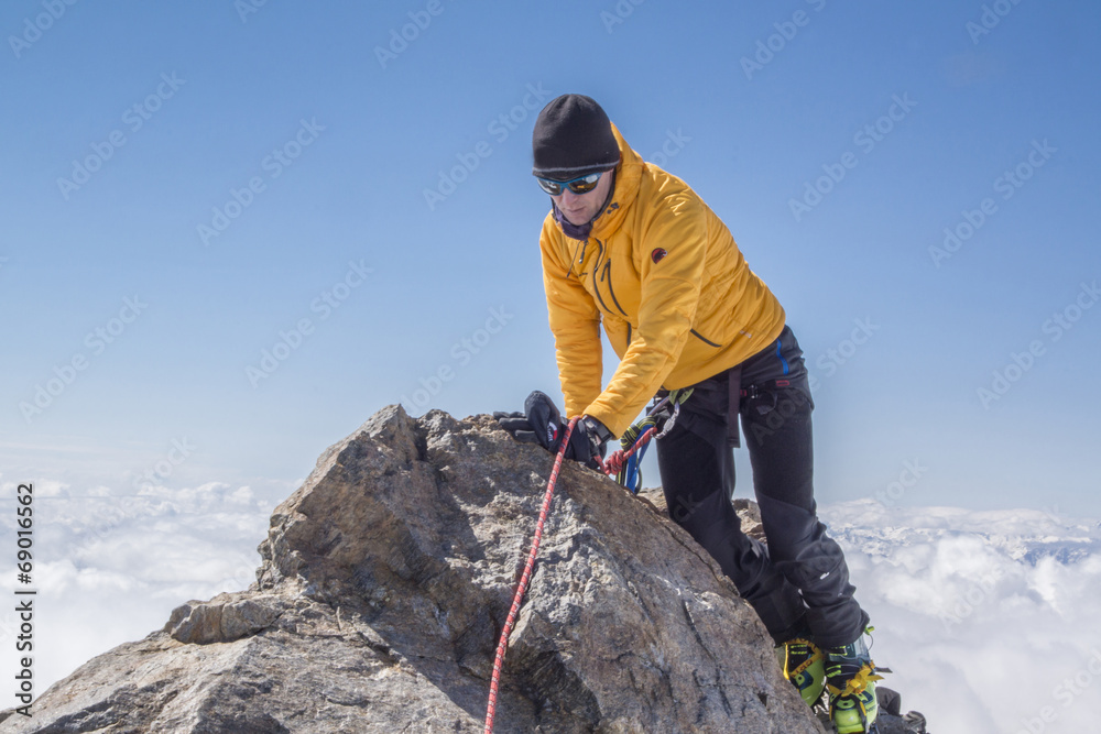 Bergsteiger in den Alpen Stock-Foto | Adobe Stock